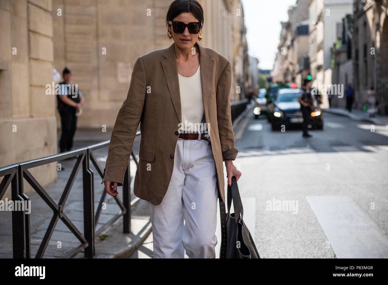Irina Linovich arriving on the street before the Armani runway show ...