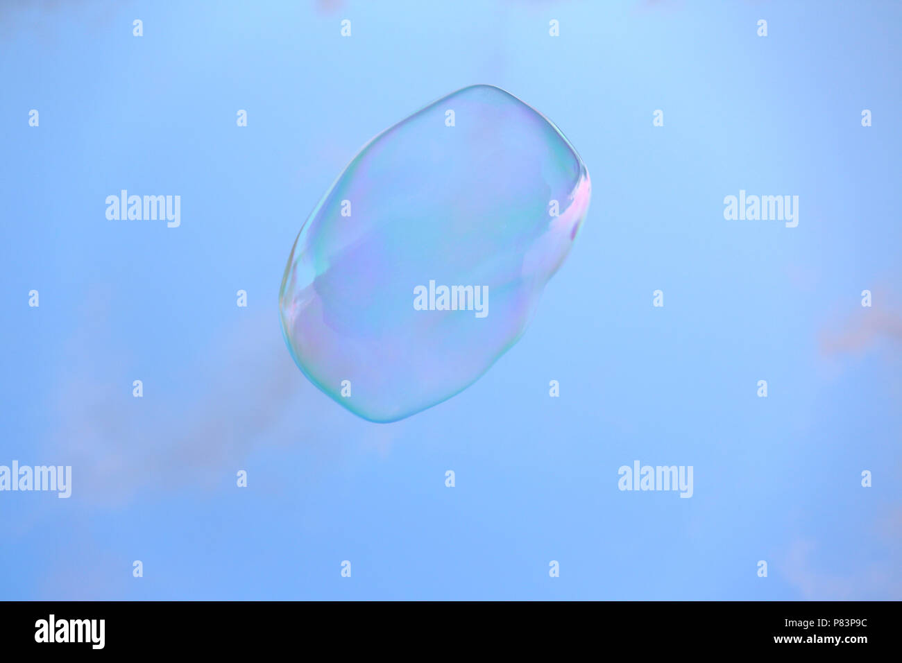 Rectangular shaped floating bubble against clear blue sky Stock Photo ...