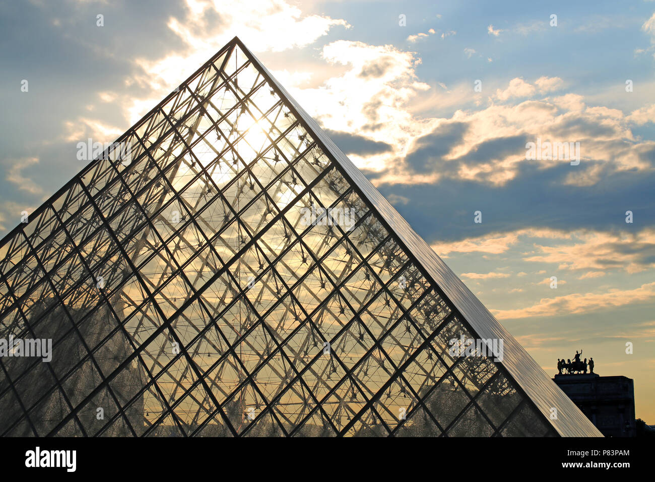 Louvre pyramid sunset hi-res stock photography and images - Alamy