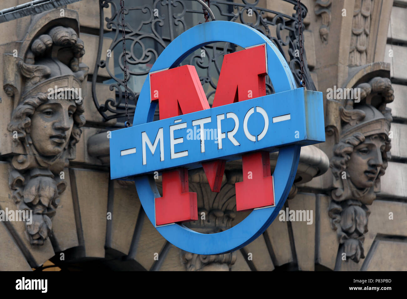 Contemporary Metro sign in front of old wall, Paris, France, Europe ...