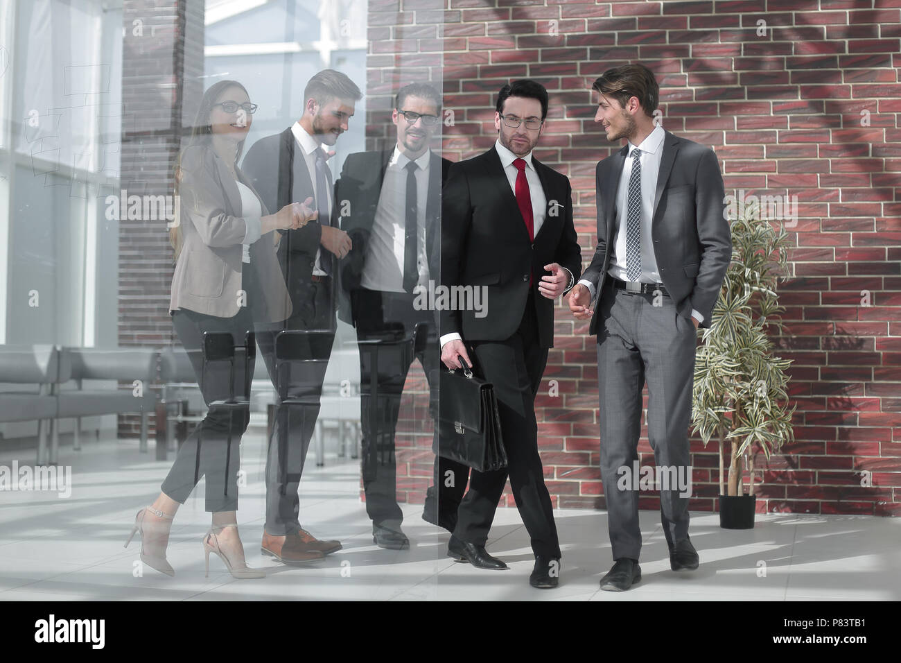 business colleagues in the office during working hours Stock Photo - Alamy