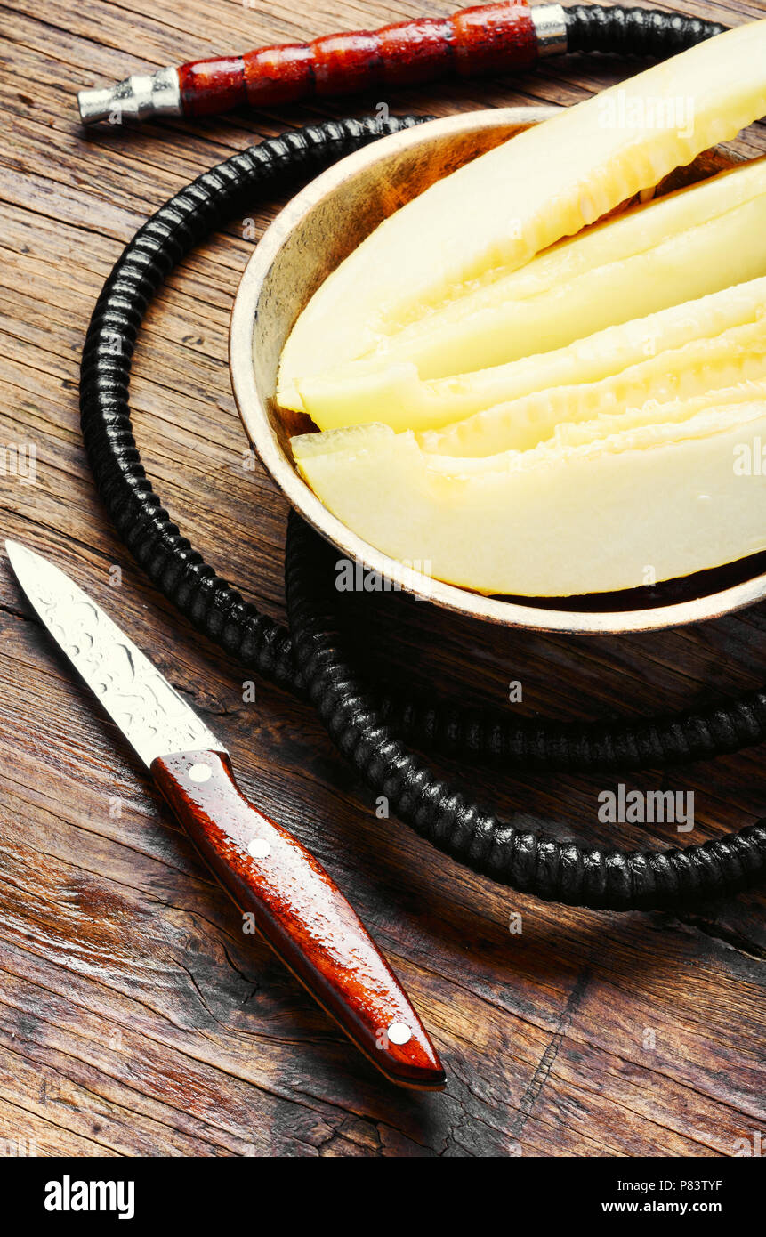 Oriental hookah with the aroma melon for relax.Melon shisha Stock Photo ...
