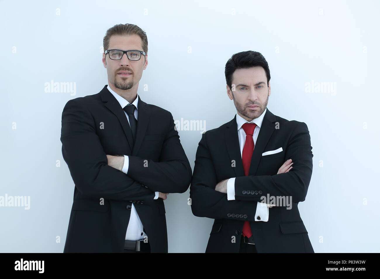 Two confident men stand hi-res stock photography and images - Alamy