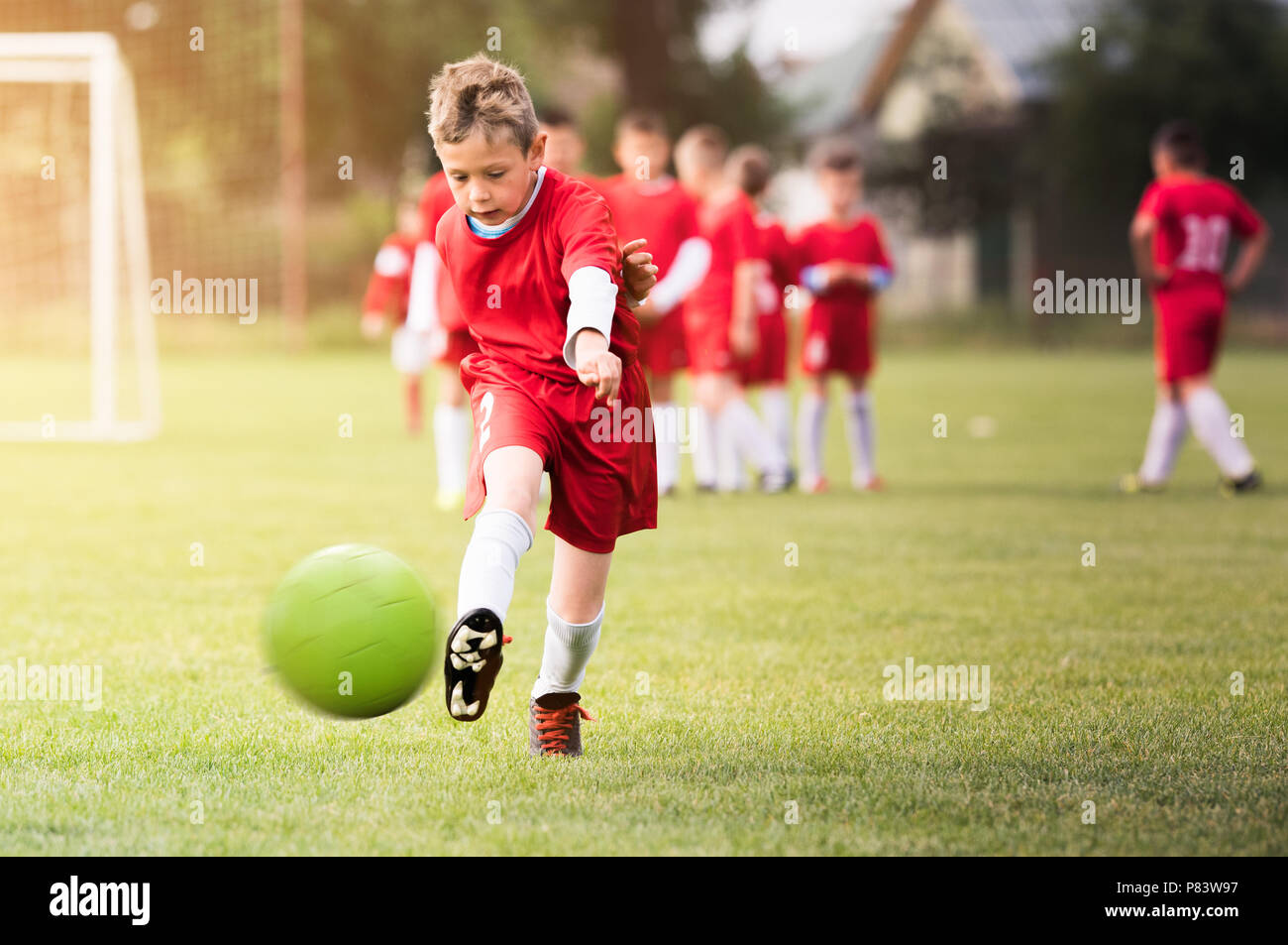 Kids soccer football - young children players match on soccer field ...