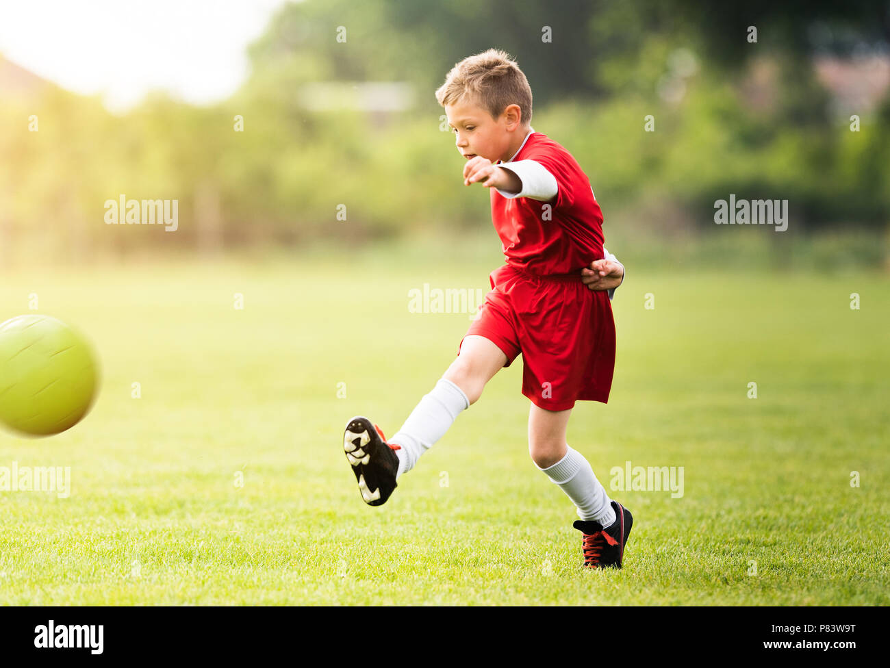 Kids soccer football - young children players match on soccer field ...