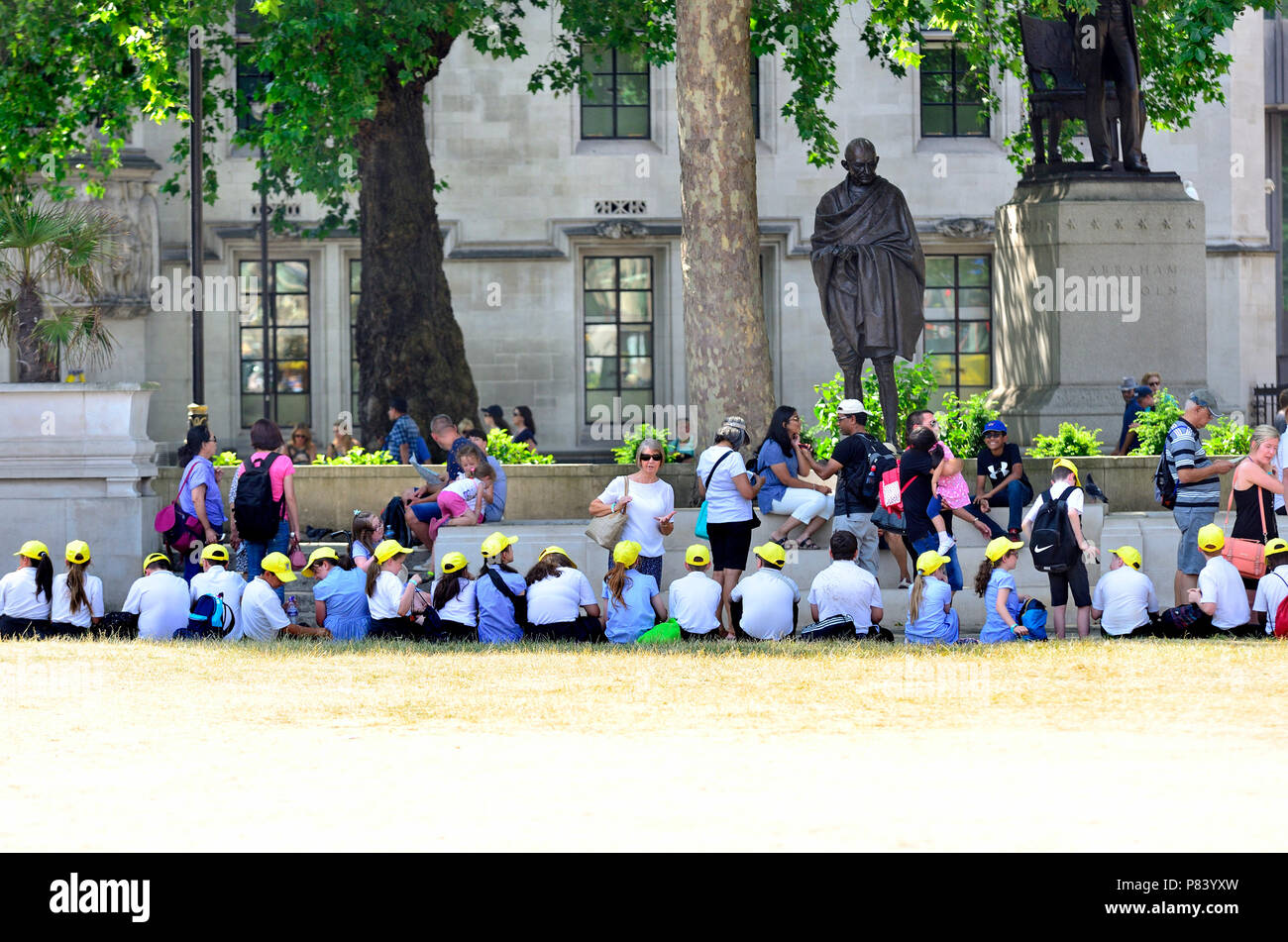 Primary schoolchildren on a school trip in Parliament Square, during a ...