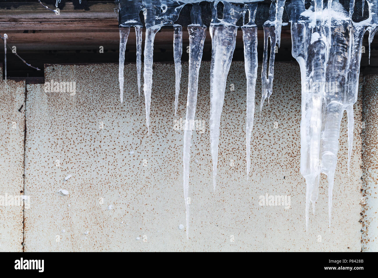 Icicles on roof drainpipe hi-res stock photography and images - Alamy