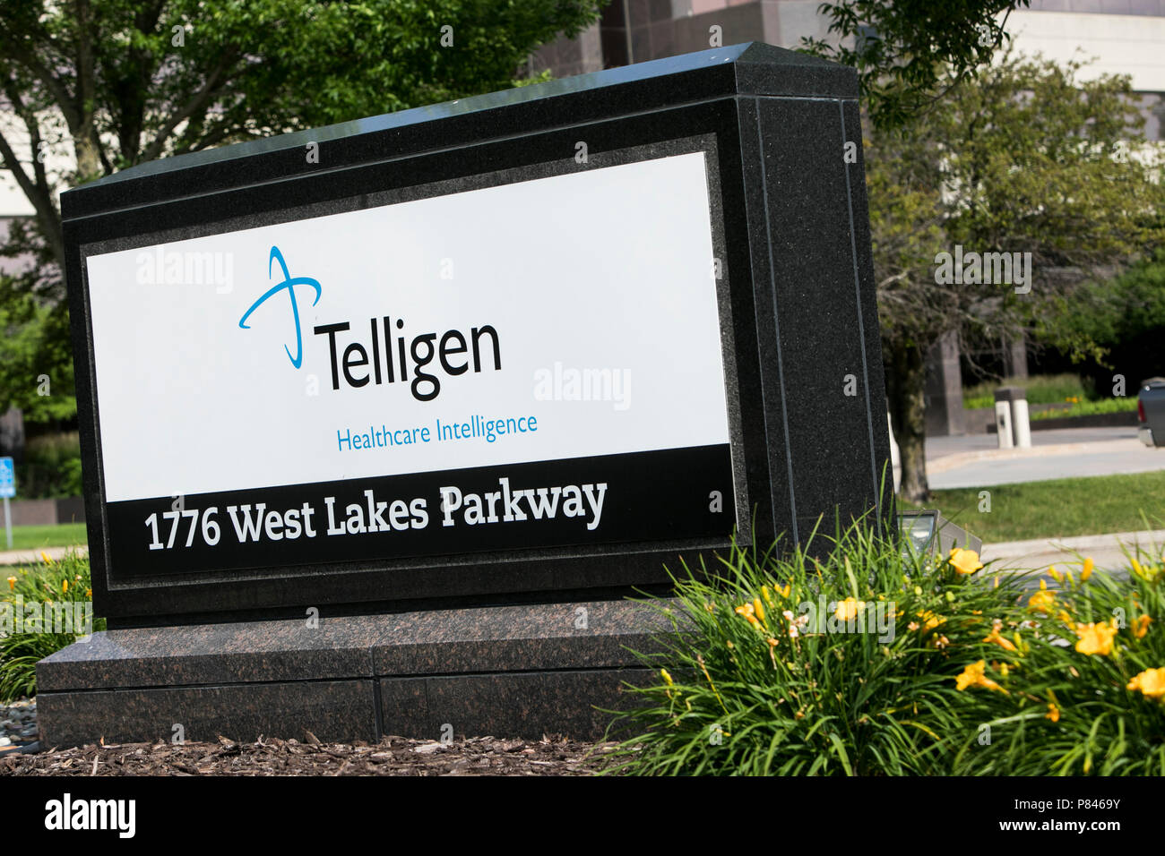 A logo sign outside of the headquarters of Telligen, Inc., in West Des ...