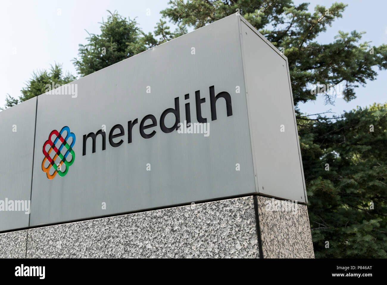 A logo sign outside of the headquarters of the Meredith Corporation in ...