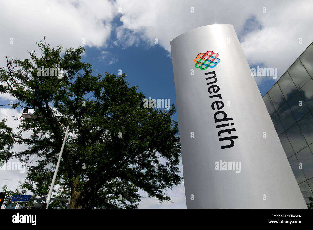 A logo sign outside of the headquarters of the Meredith Corporation in ...