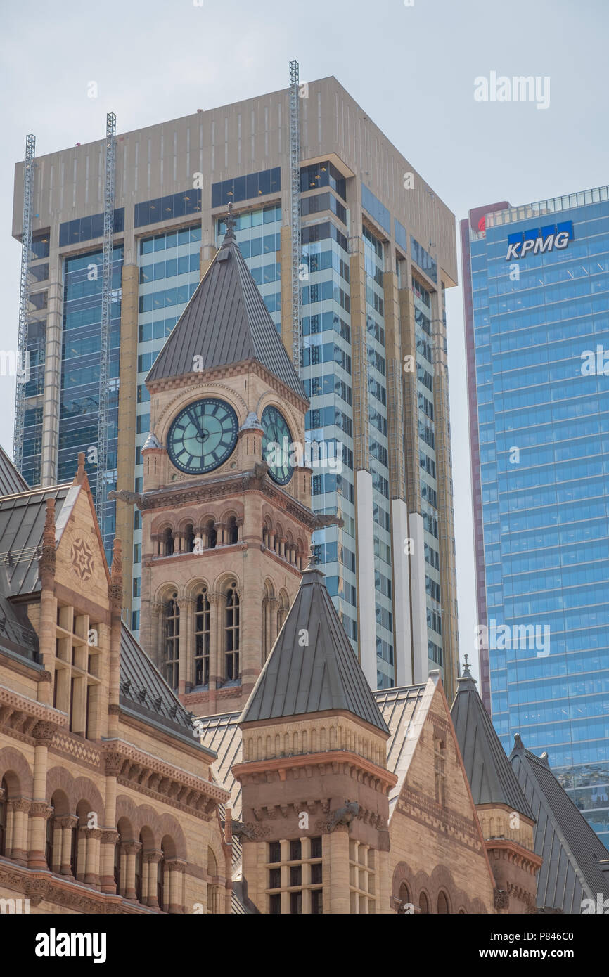 Toronto Old City Hall clock tower juxtaposed against the modern ...