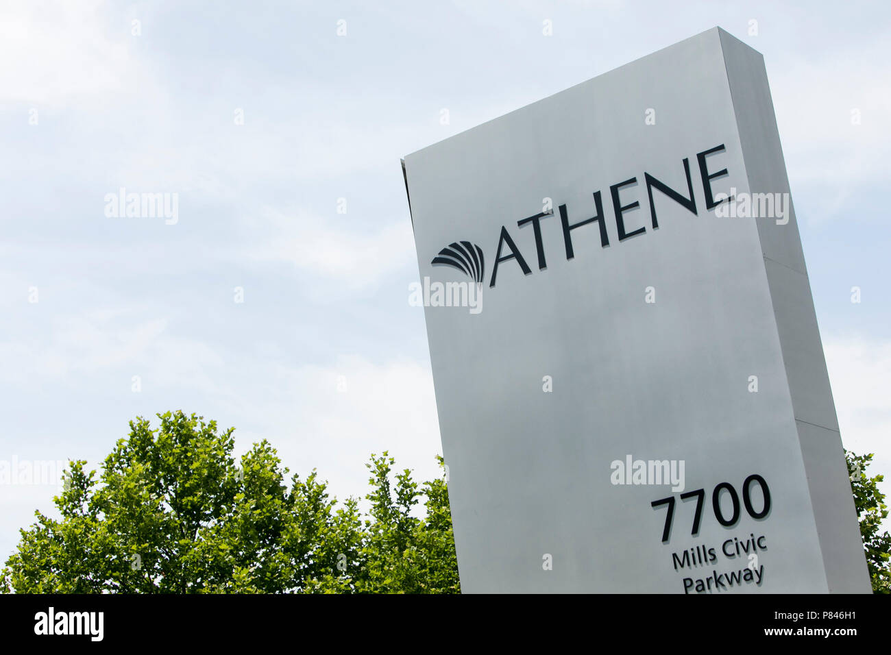 A logo sign outside of a facility occupied by Athene Holding in West ...