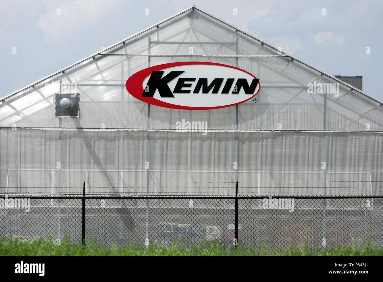 A logo sign outside of a facility occupied by Kemin Industries in Des ...