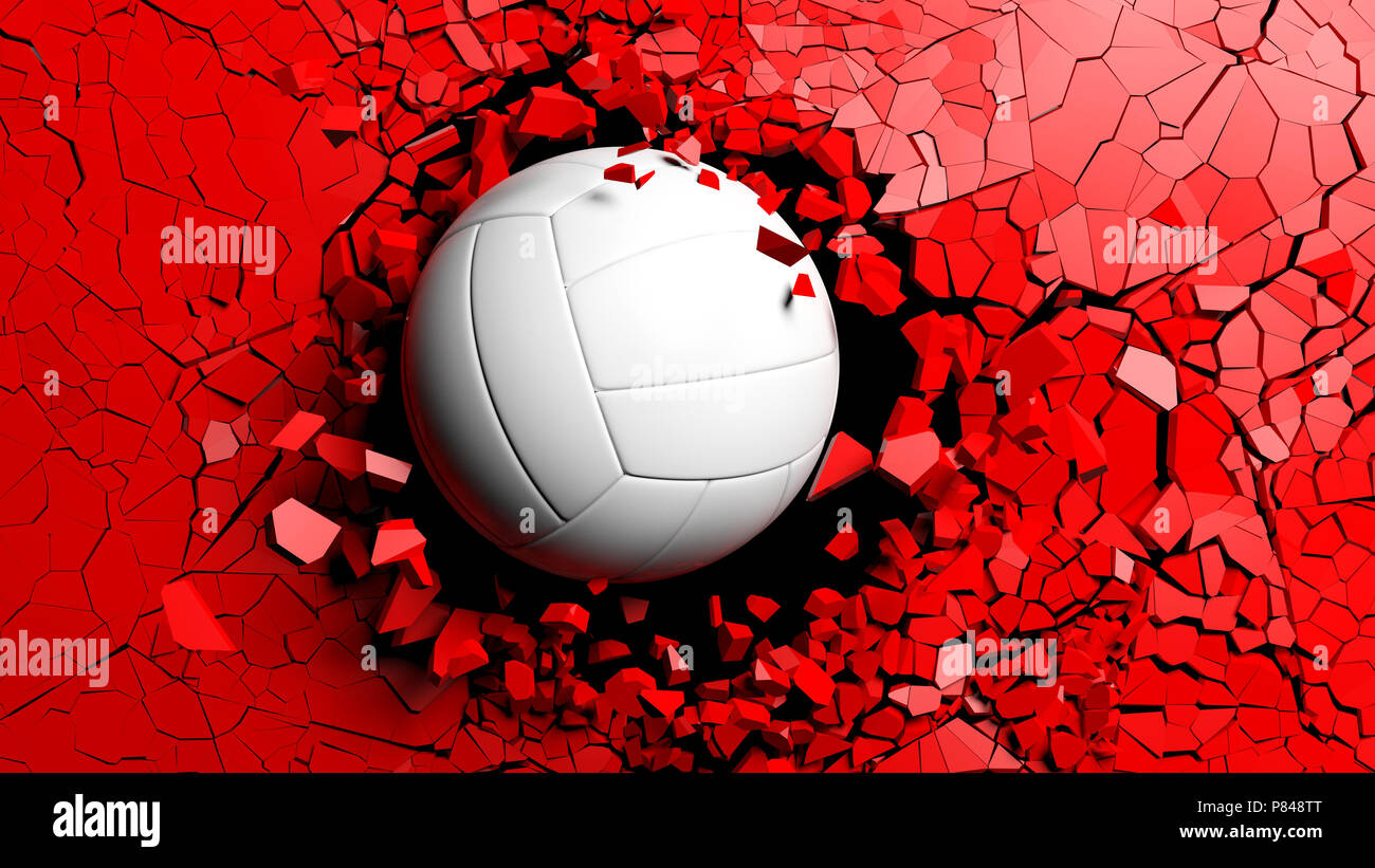 Sports concept. Volleyball ball breaking with great force through a red ...