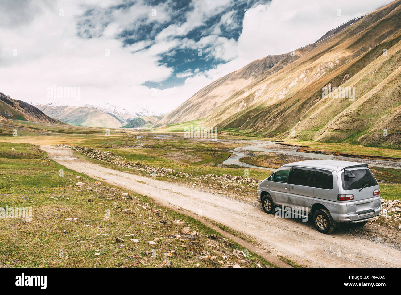 SUV Car On Off Road In Spring Mountains Landscape In Truso Gorge ...