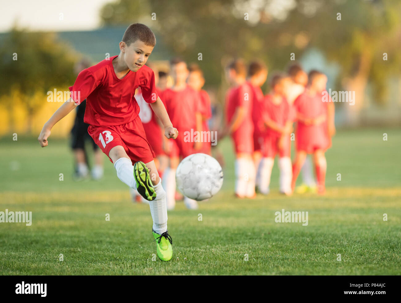 Kids soccer football - young children players match on soccer field ...