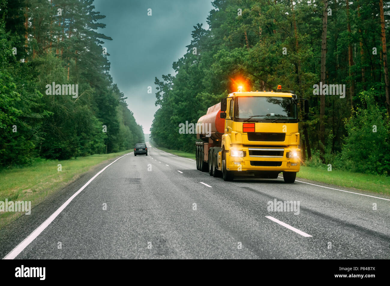 Yellow Tank Truck Or Tanker Truck, Transporting Gasoline On Country ...