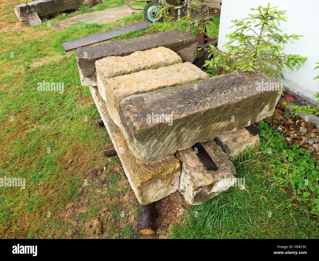Heap of authentic soft sandstone blocks prepare for rebuilding of old ...