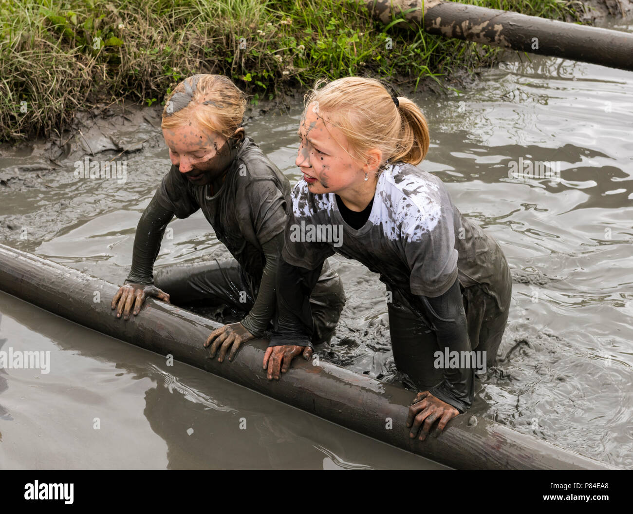 Children play mud outdoors hi-res stock photography and images - Alamy