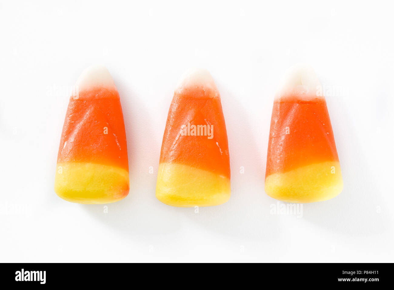 Typical halloween candy corn isolated on white background. Top view ...