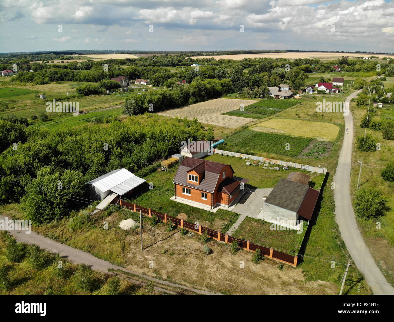 Rural scene field houses hi-res stock photography and images - Alamy