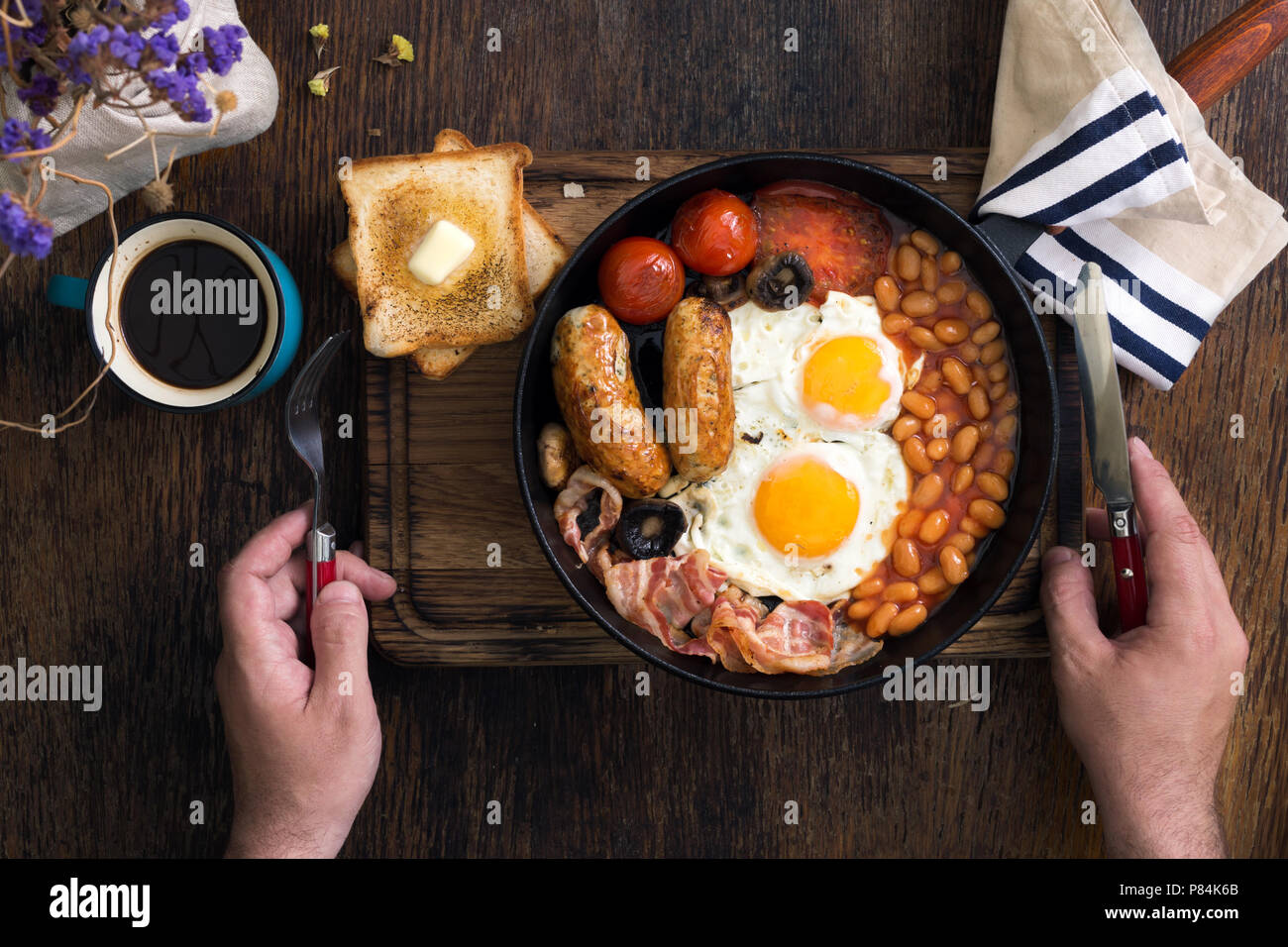 Full english breakfast man hi-res stock photography and images - Alamy