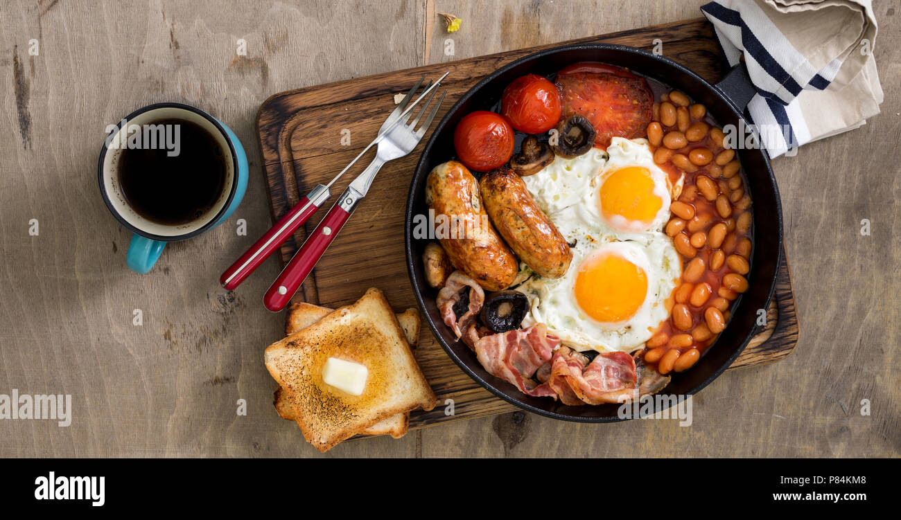 English breakfast on wooden table with copy space, top view Stock Photo ...