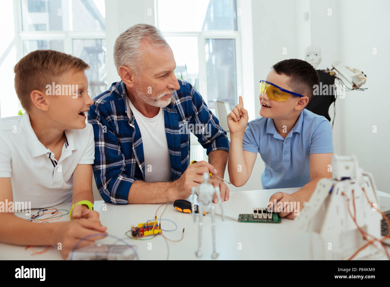 Nice smart boy sharing his idea Stock Photo - Alamy