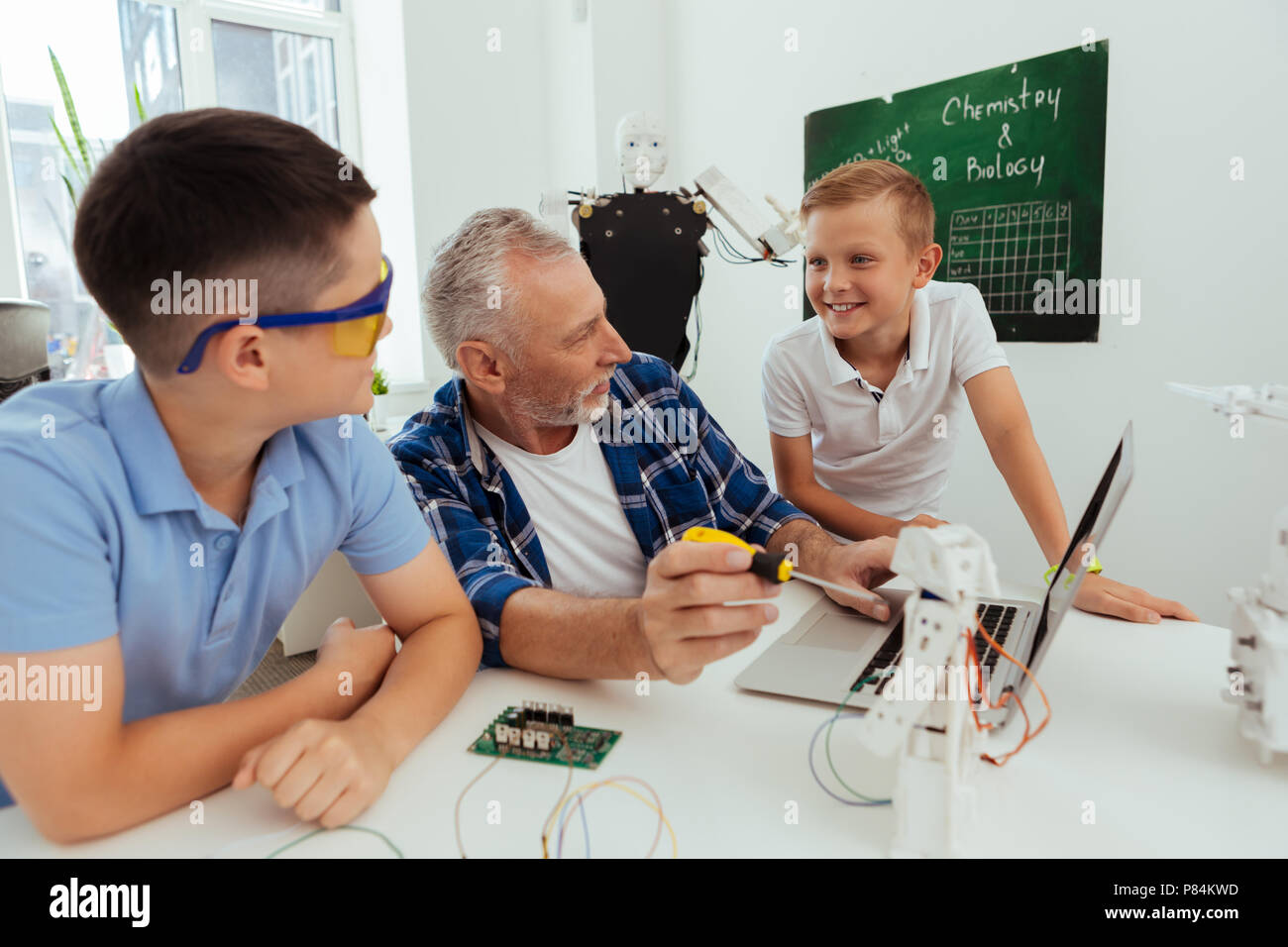Happy positive boy talking to his friend Stock Photo - Alamy