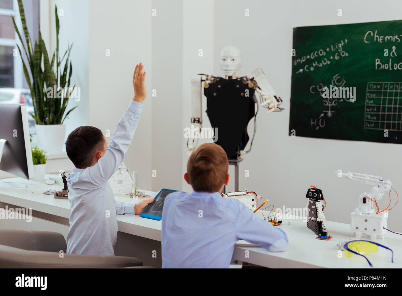 Smart nice boy knowing the answer Stock Photo - Alamy