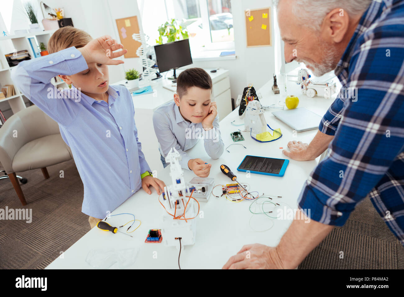 Nice smart boys working Stock Photo - Alamy