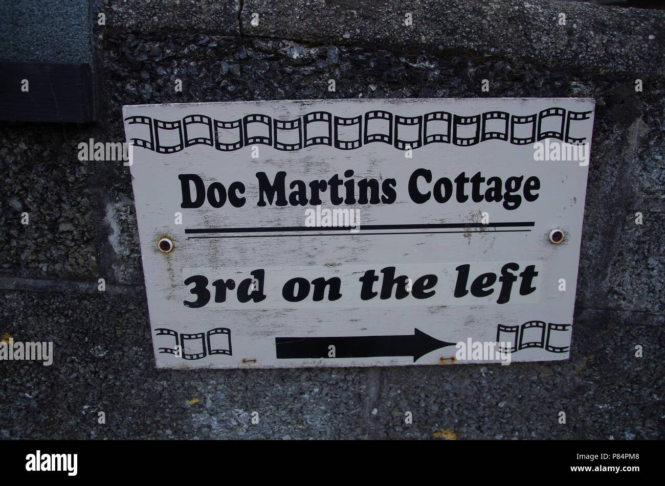 Sign for Doc martins house in Port Isaac. South west coast path. John o ...