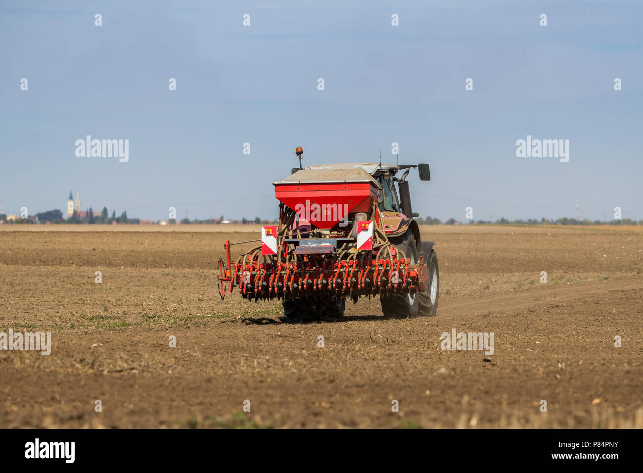 Farmer seeding, sowing crops at field. Sowing is the process of ...