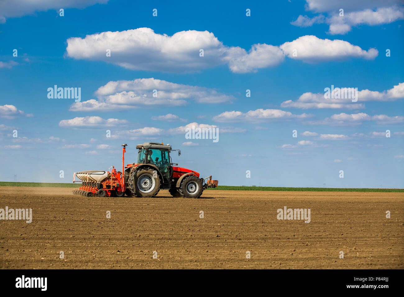Farmer seeding, sowing crops at field. Sowing is the process of ...
