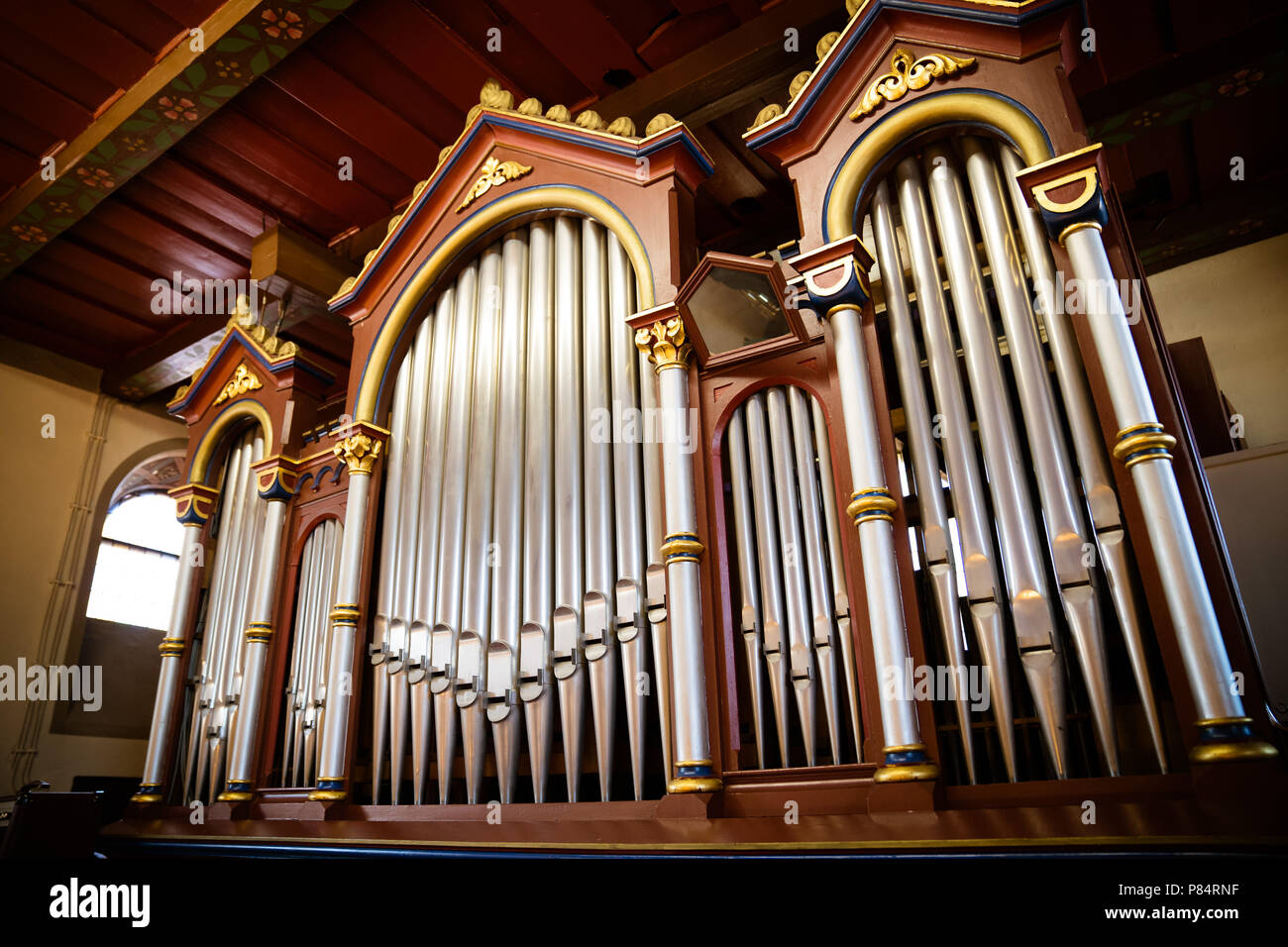 The organ in the church made of wood old and restored Stock Photo - Alamy
