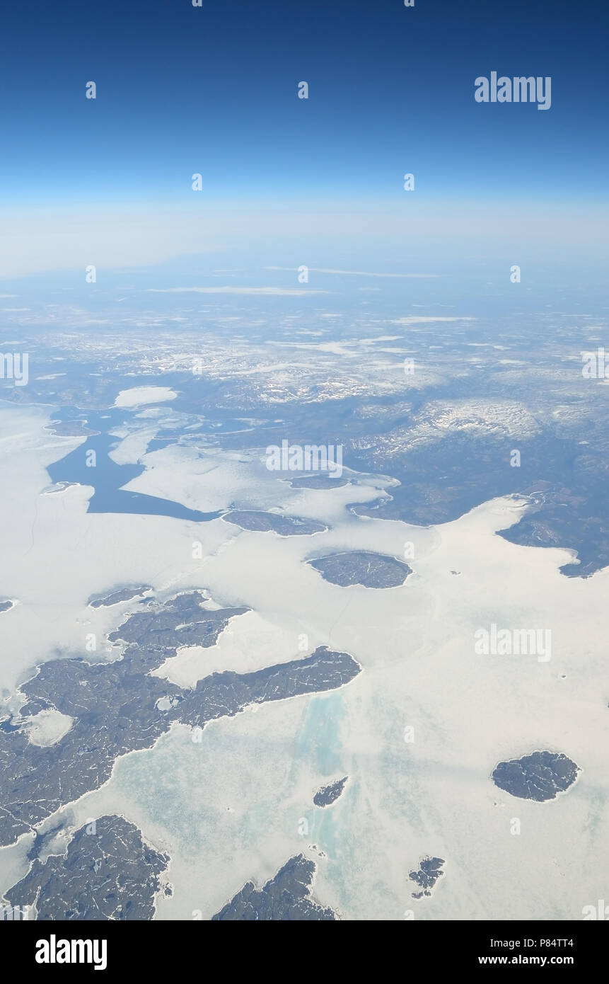 View of winter landscape as seen from an airplane window Stock Photo ...