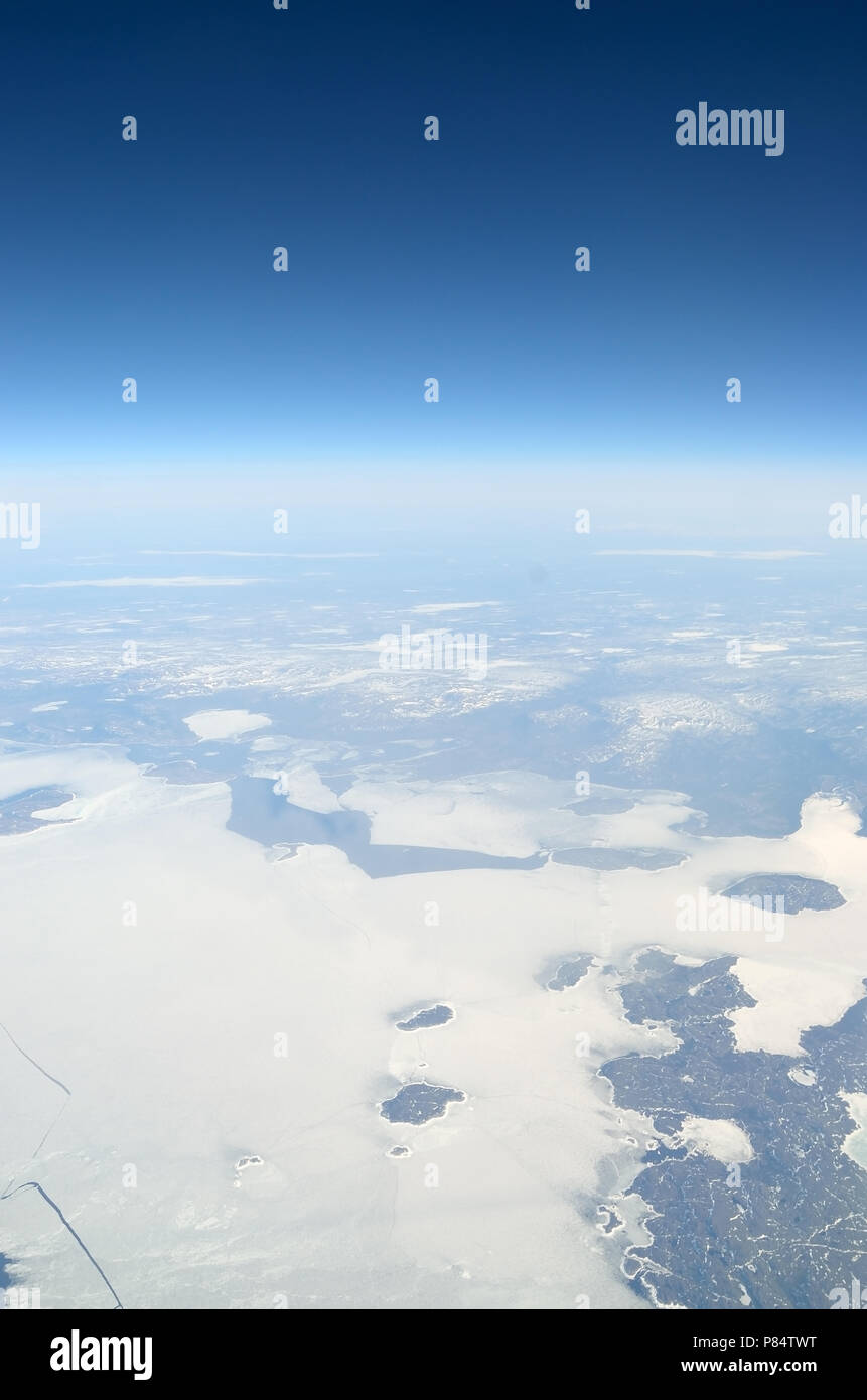 View of winter landscape as seen from an airplane window Stock Photo ...