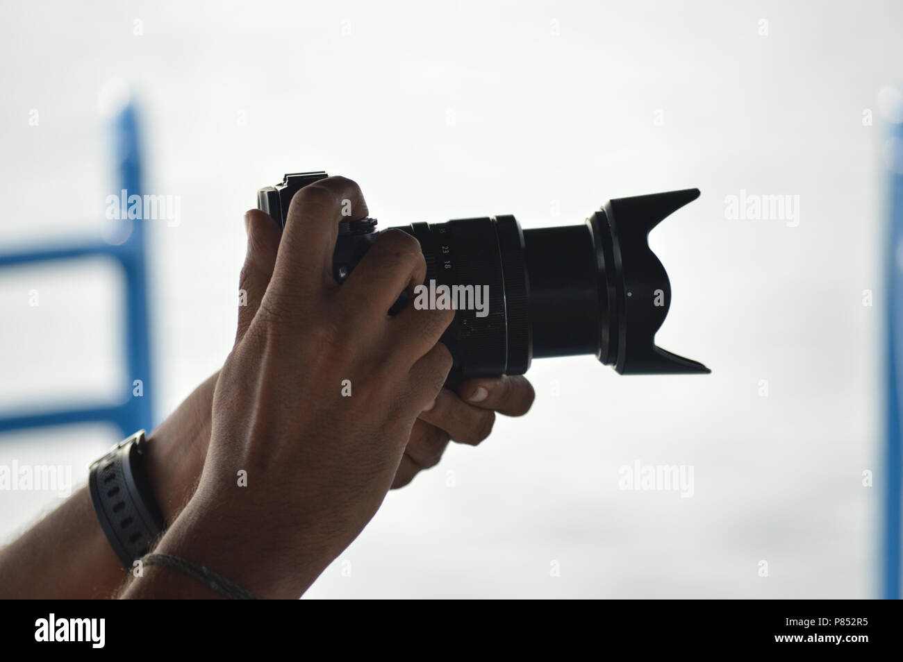 Clicking picture with camera Stock Photo - Alamy