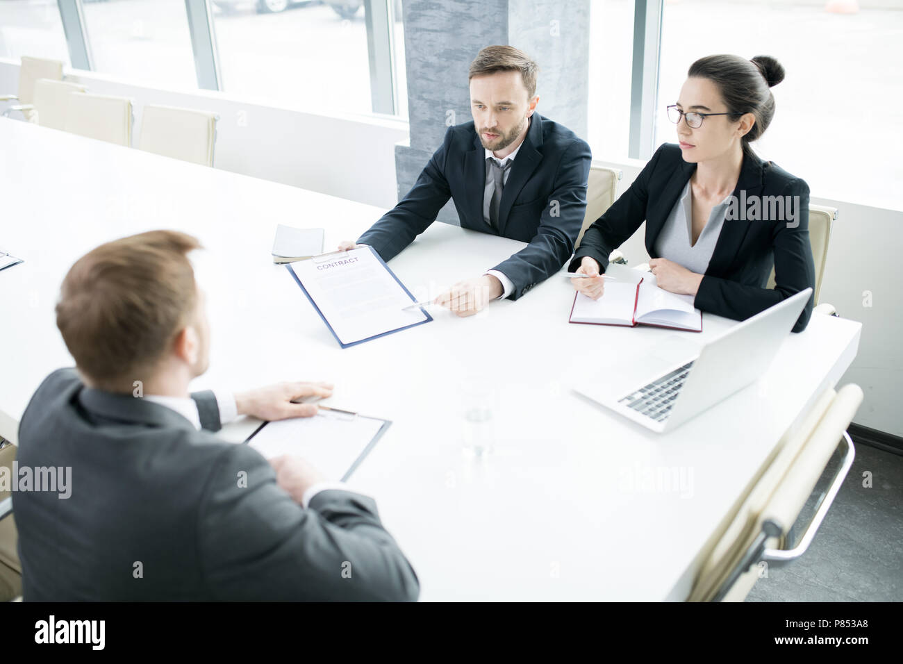 Business People at Meeting Table Stock Photo - Alamy