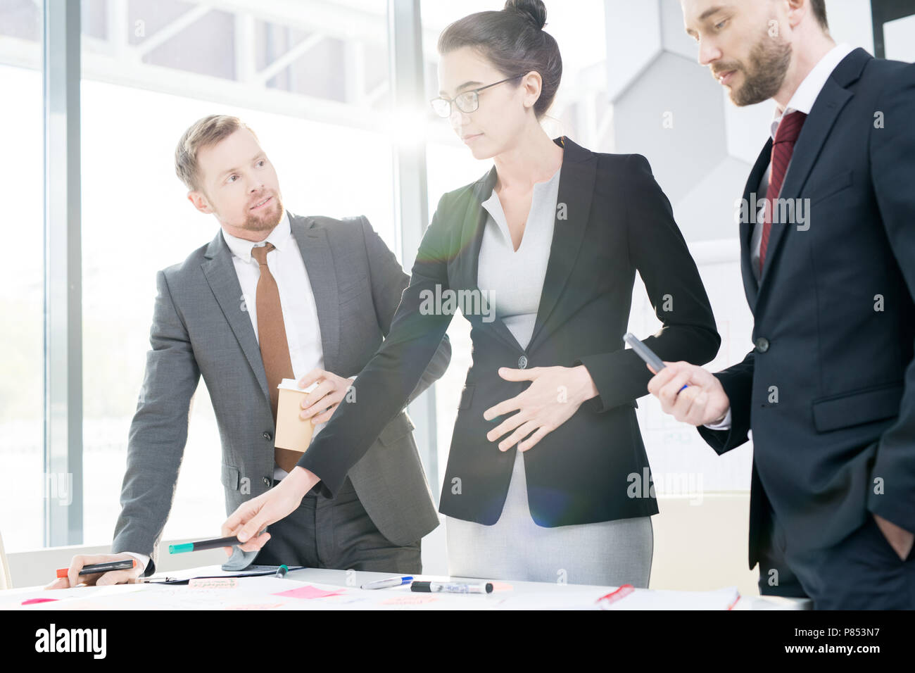 Business Team Collaborating in Meeting Stock Photo - Alamy