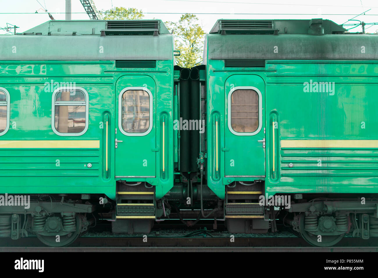 two green passenger wagons Stock Photo - Alamy
