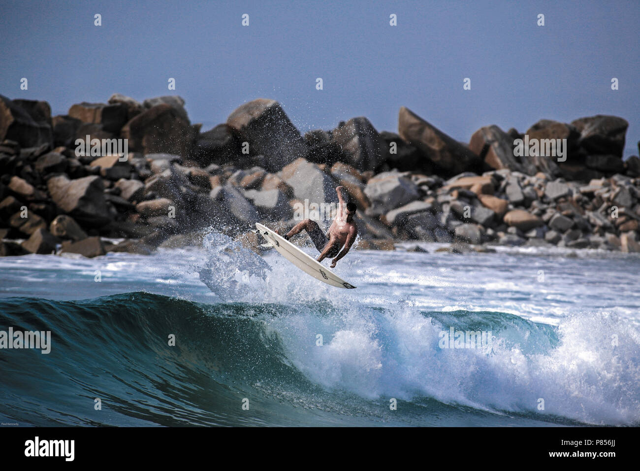 Surfer performing an aerial at surfing beach in Oaxaca, Mexico Stock ...