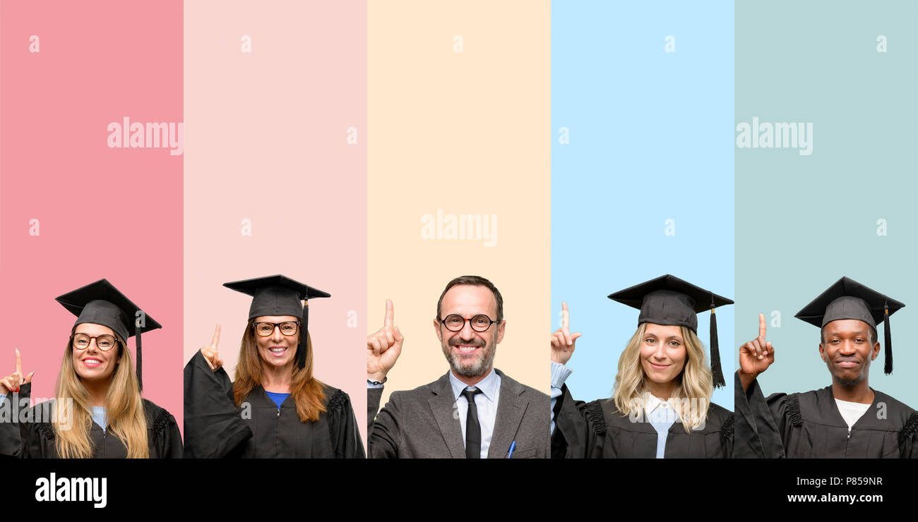 Senior teacher with his graduate students raising finger, the number ...