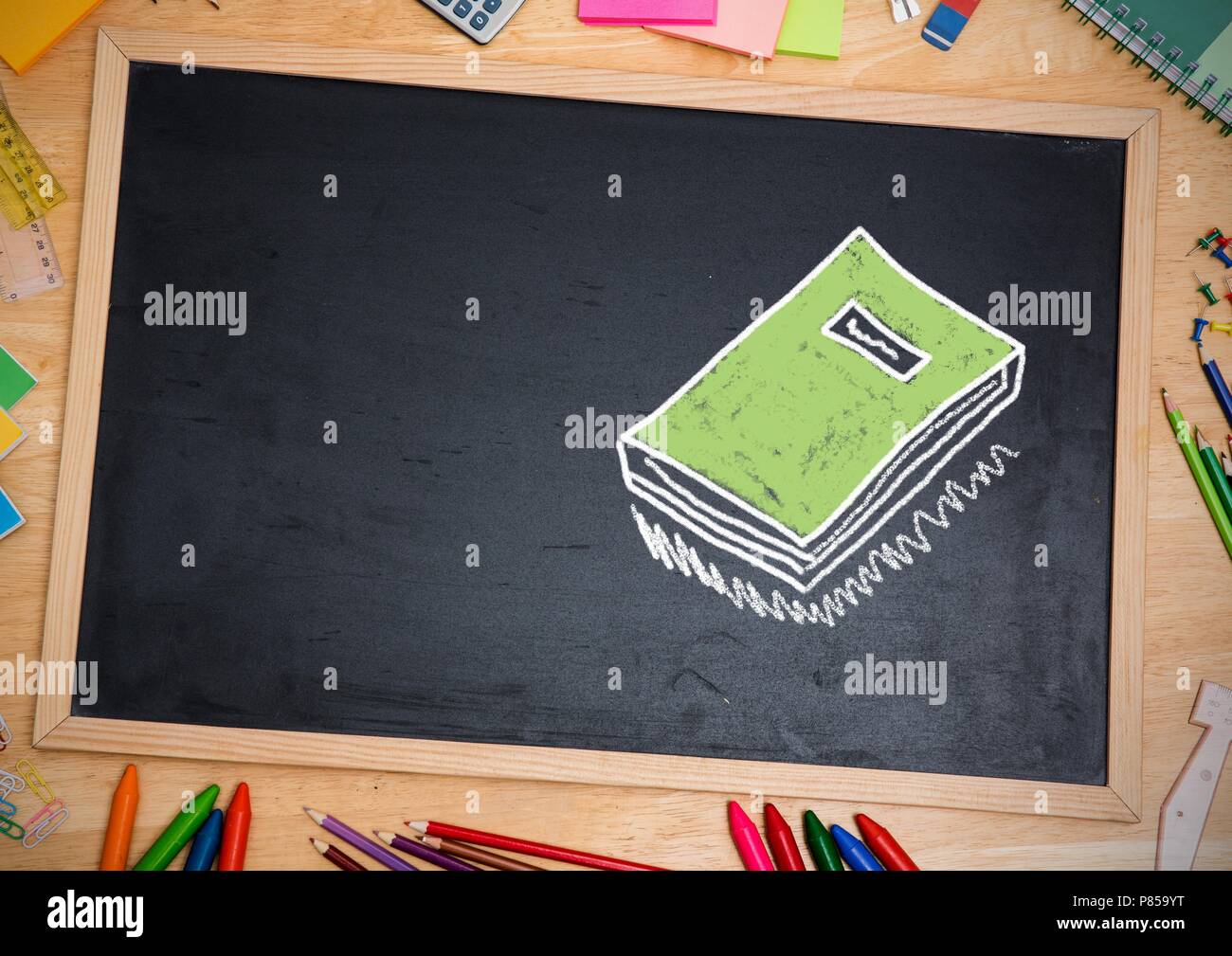 Folder notes education drawing on blackboard for school Stock Photo - Alamy