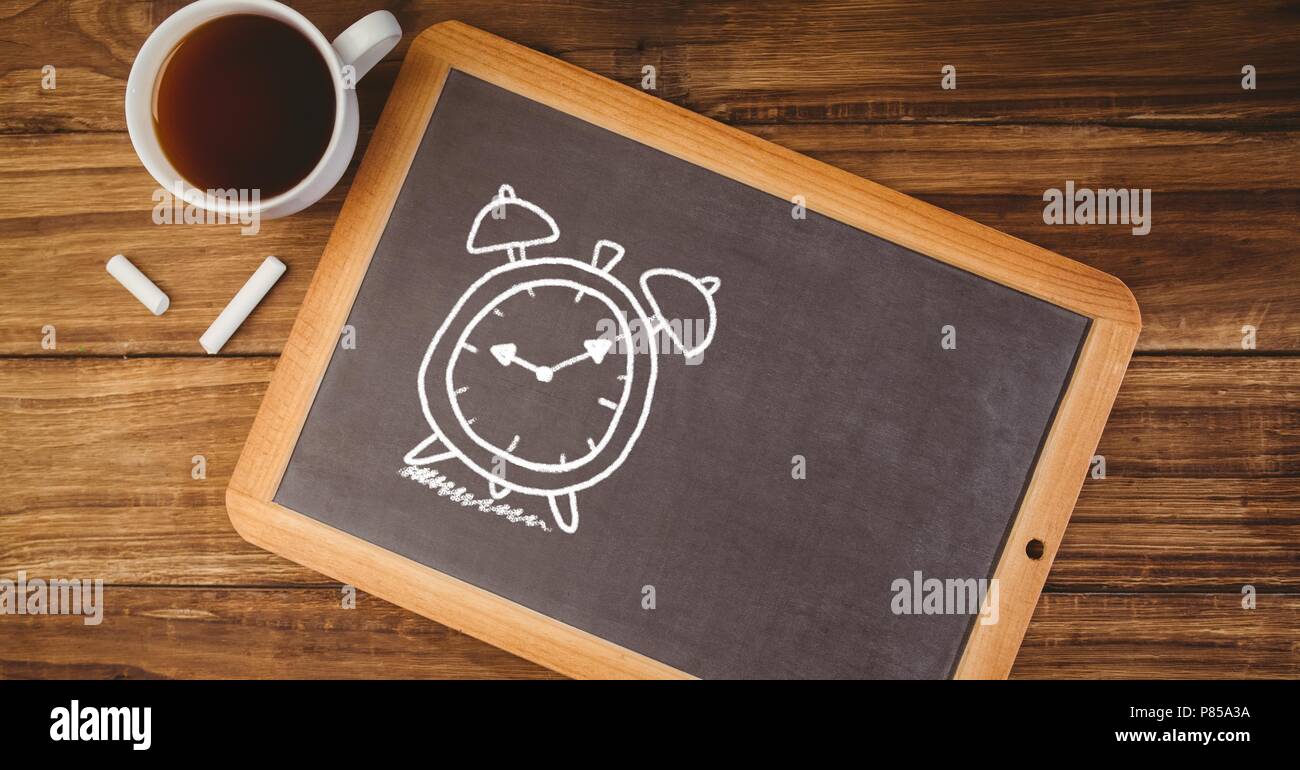 Clock time Education drawing on blackboard with coffee Stock Photo - Alamy