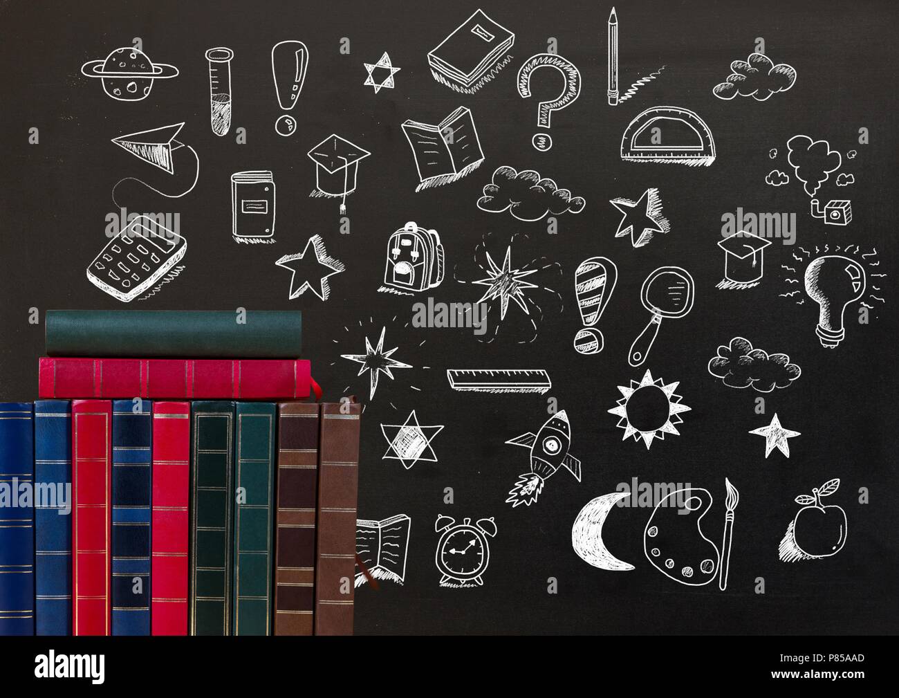 Education drawing on blackboard for school with books Stock Photo - Alamy