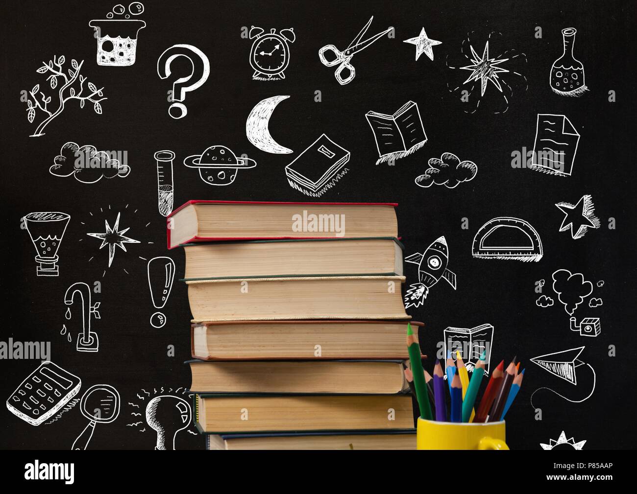 Education drawing on blackboard for school with books Stock Photo - Alamy