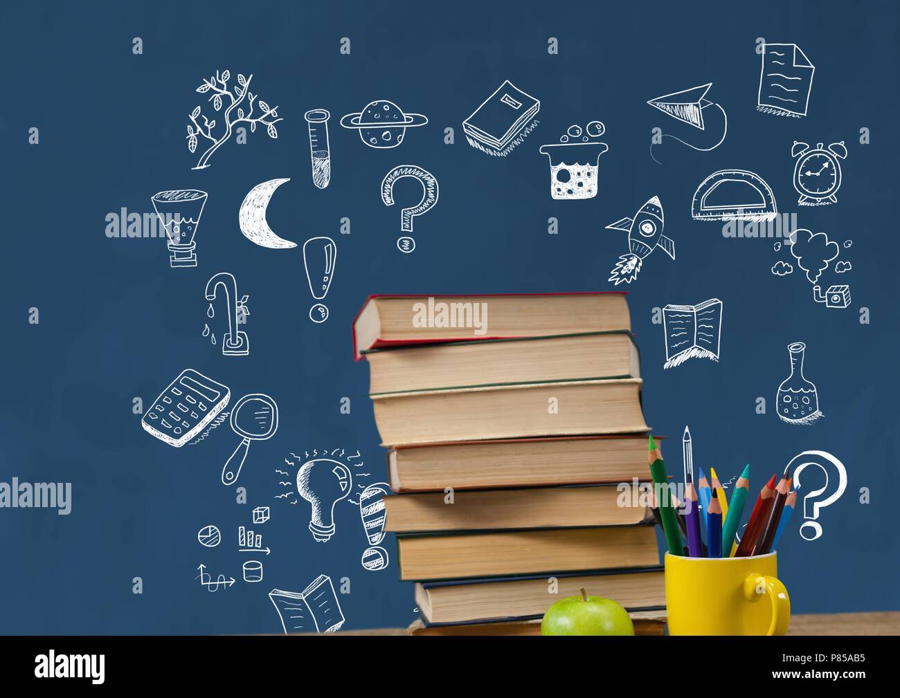 Education drawing on blackboard for school with books Stock Photo - Alamy
