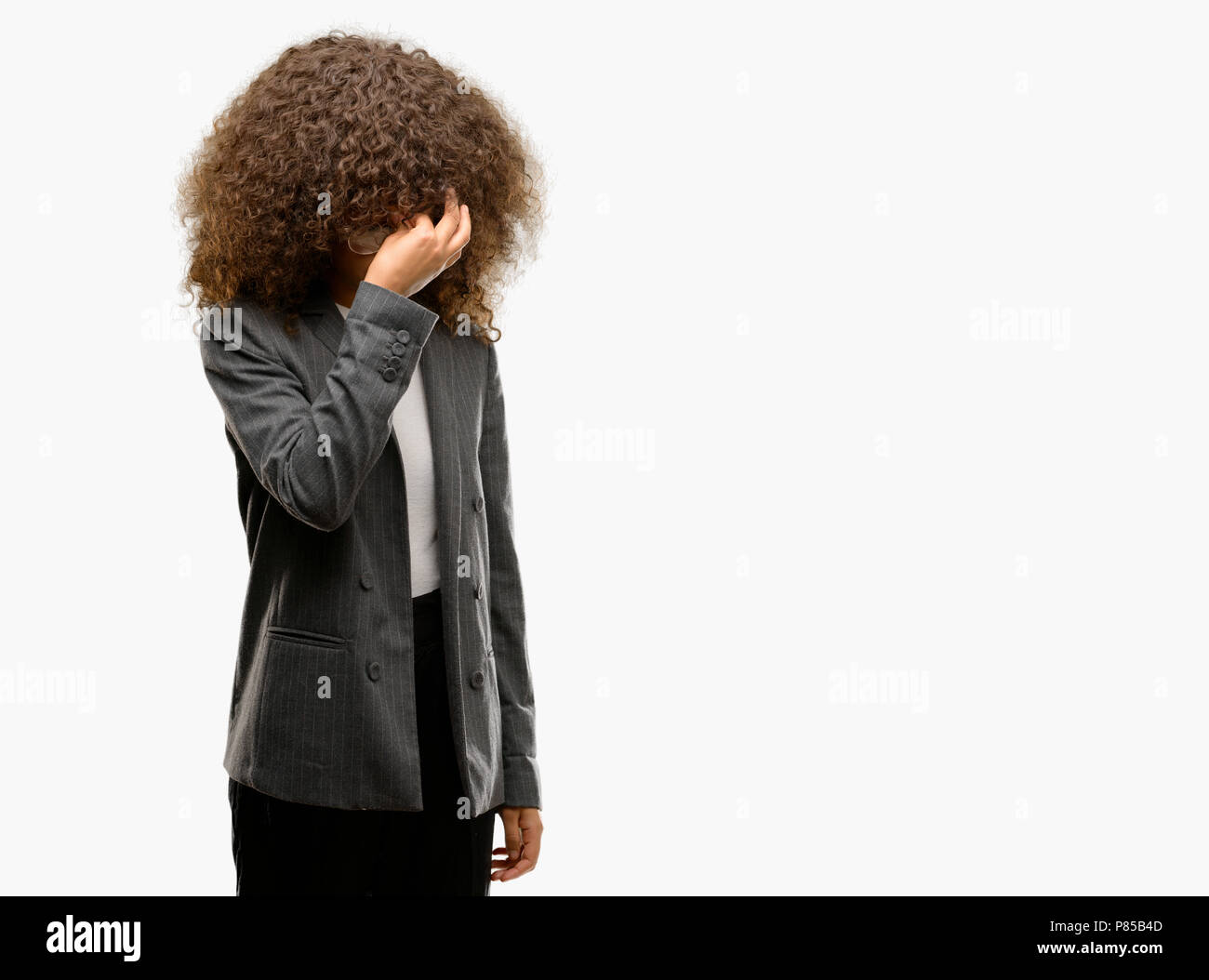 African american business woman wearing glasses tired rubbing nose and ...