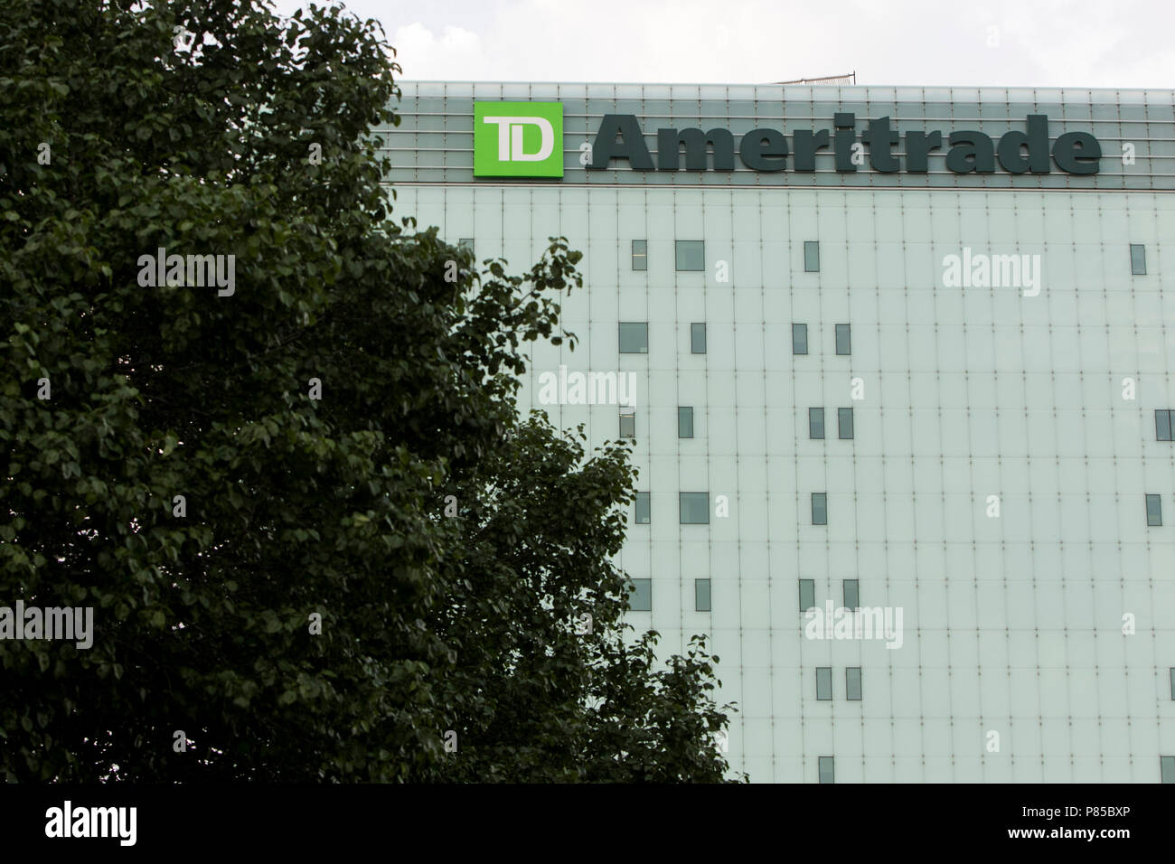 A logo sign outside of the headquarters of TD Ameritrade in Omaha ...